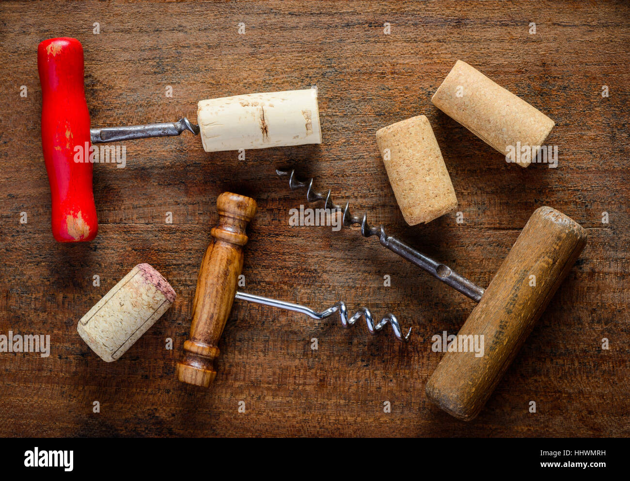 Different corksrew and cork wine opener Stock Photo - Alamy