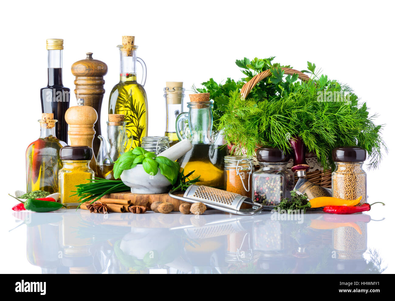 Olive Cooking Oil, green Herbs and Spices isolated on white background ...