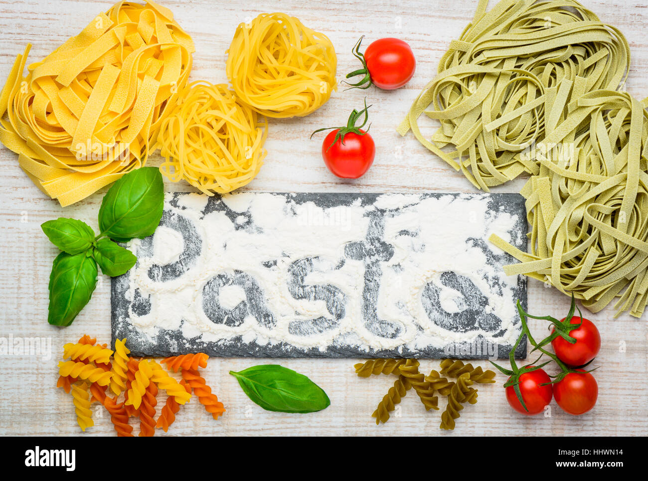 Tagliatelle Fettuccine pasta with Fusilli and tomato with Pasta text in ...