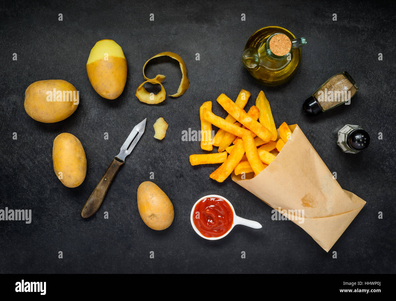 Paper Bag of French Fries with Potatoes, Ketchup and Condiments Stock ...