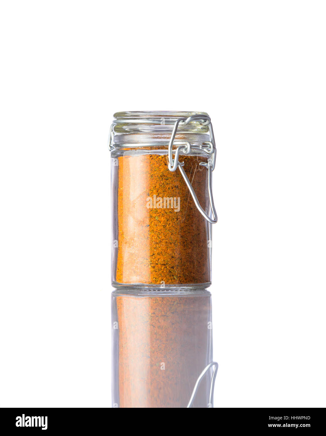 Glass Jar of curry powder isolated on white background Stock Photo - Alamy