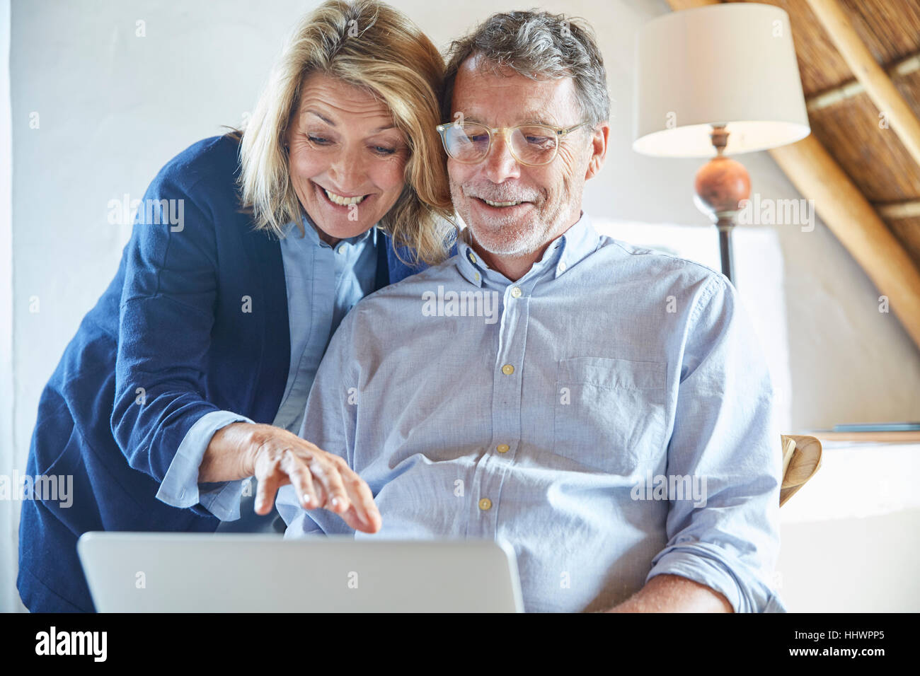 Senior man pointing laptop in hi-res stock photography and images - Alamy