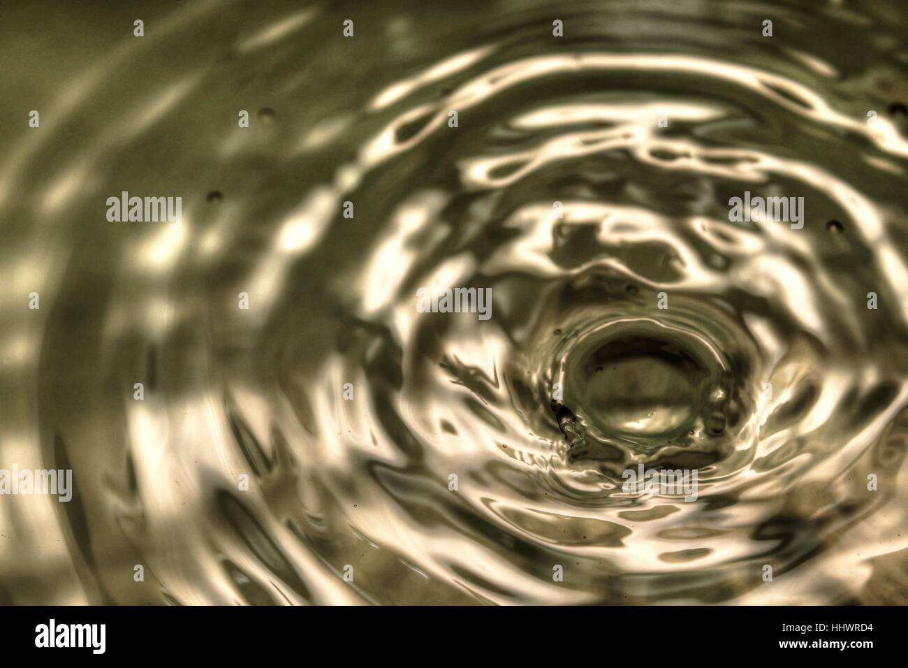 Natural water drop with waves on the surface. Difficult shot Stock ...
