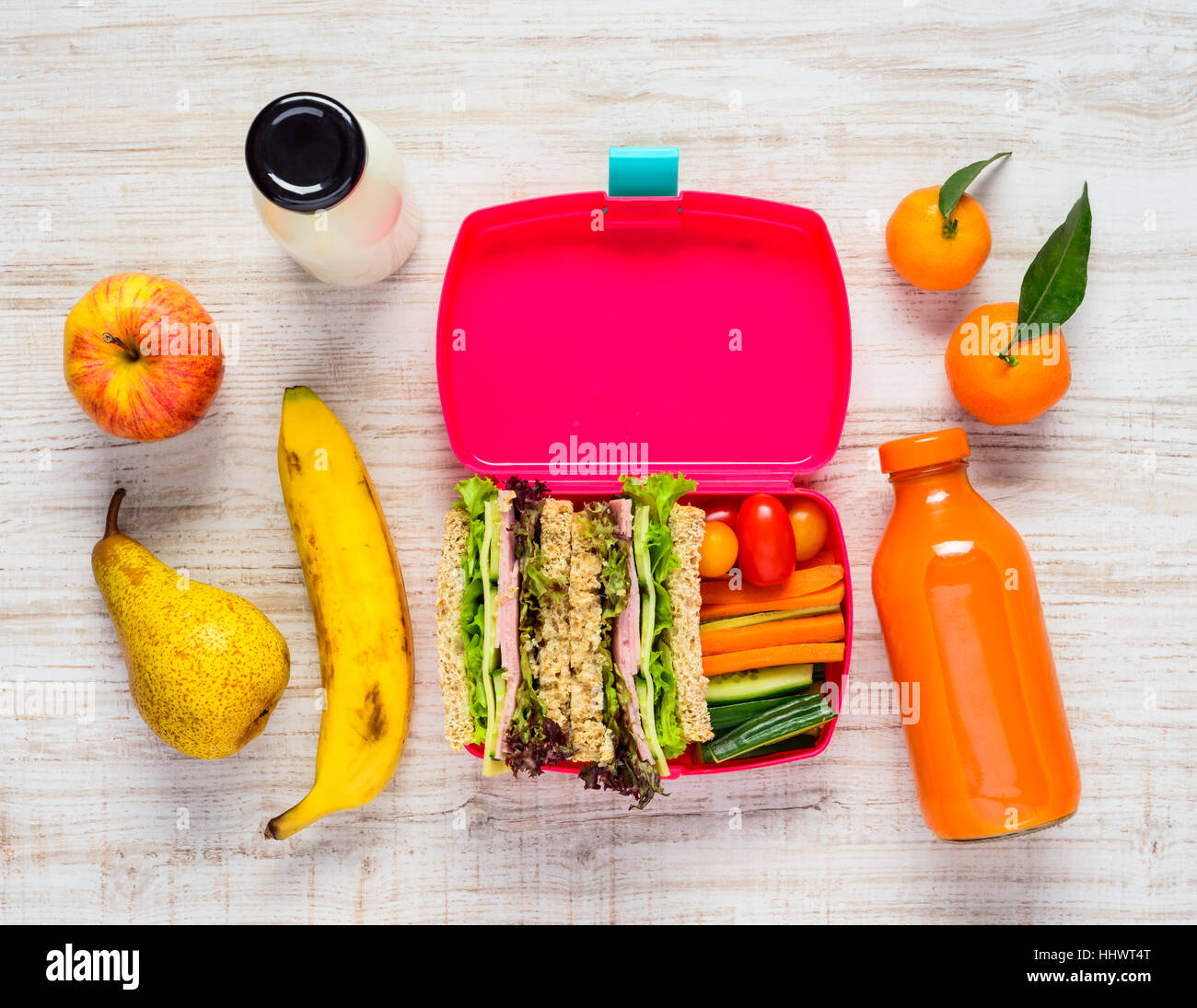 Pink Lunch Box with Sandwich, Vegetables and Fresh Fruits and Drinks in ...