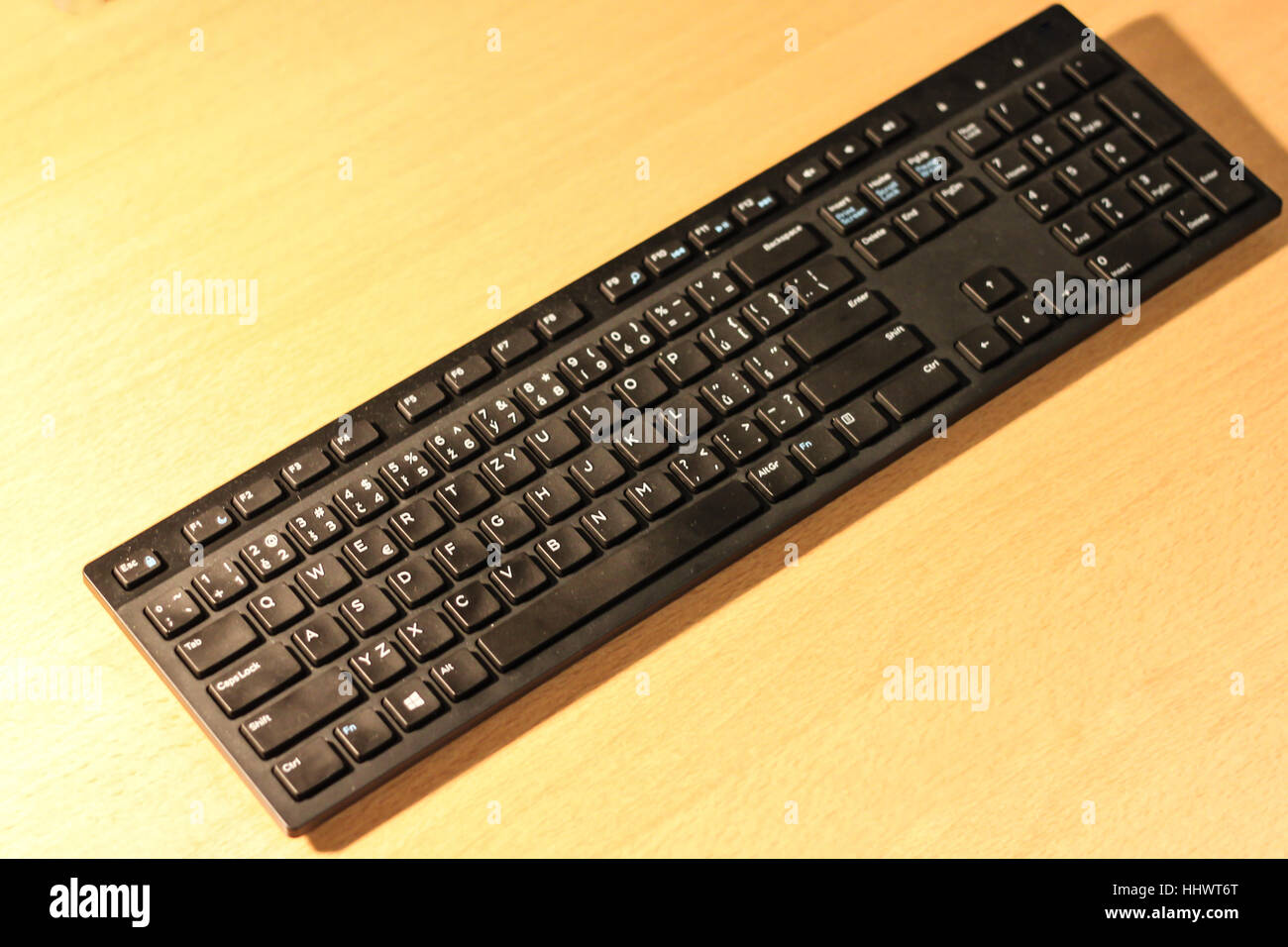 Stylish black keyboard on the desk Stock Photo - Alamy
