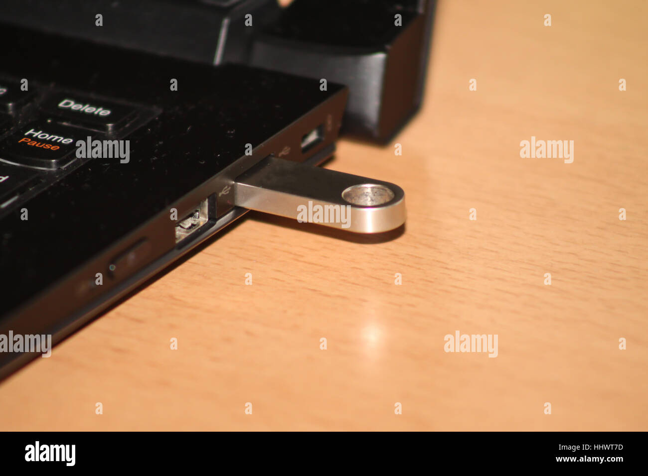 Silver USB drive sticked in the laptop Stock Photo - Alamy