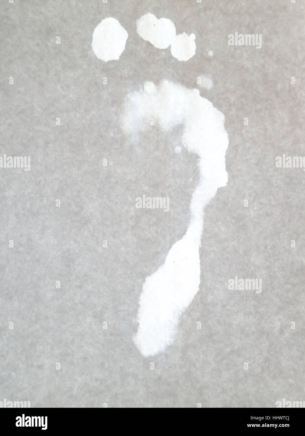 Young human female footprint on paper Stock Photo - Alamy