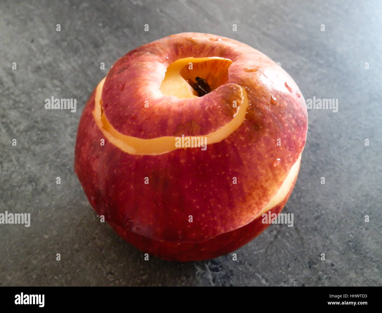Partly peeled red healthy apple Stock Photo - Alamy