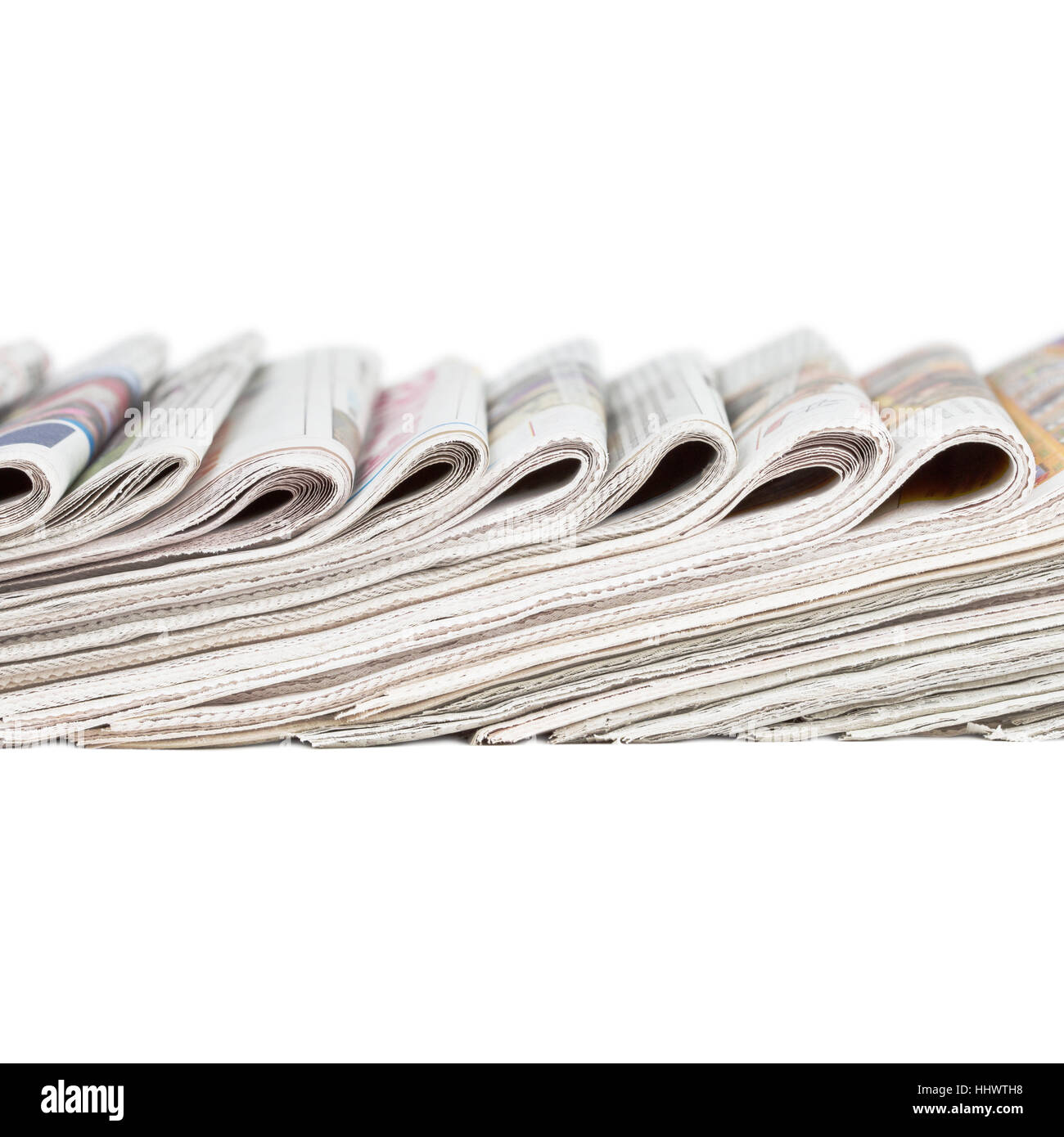 Assortment of folded newspapers isolated on white Stock Photo - Alamy