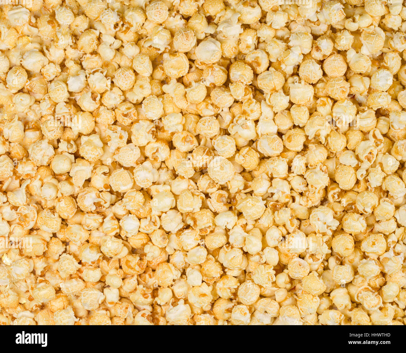 Scattered caramel popcorn, texture background. Square format Stock ...