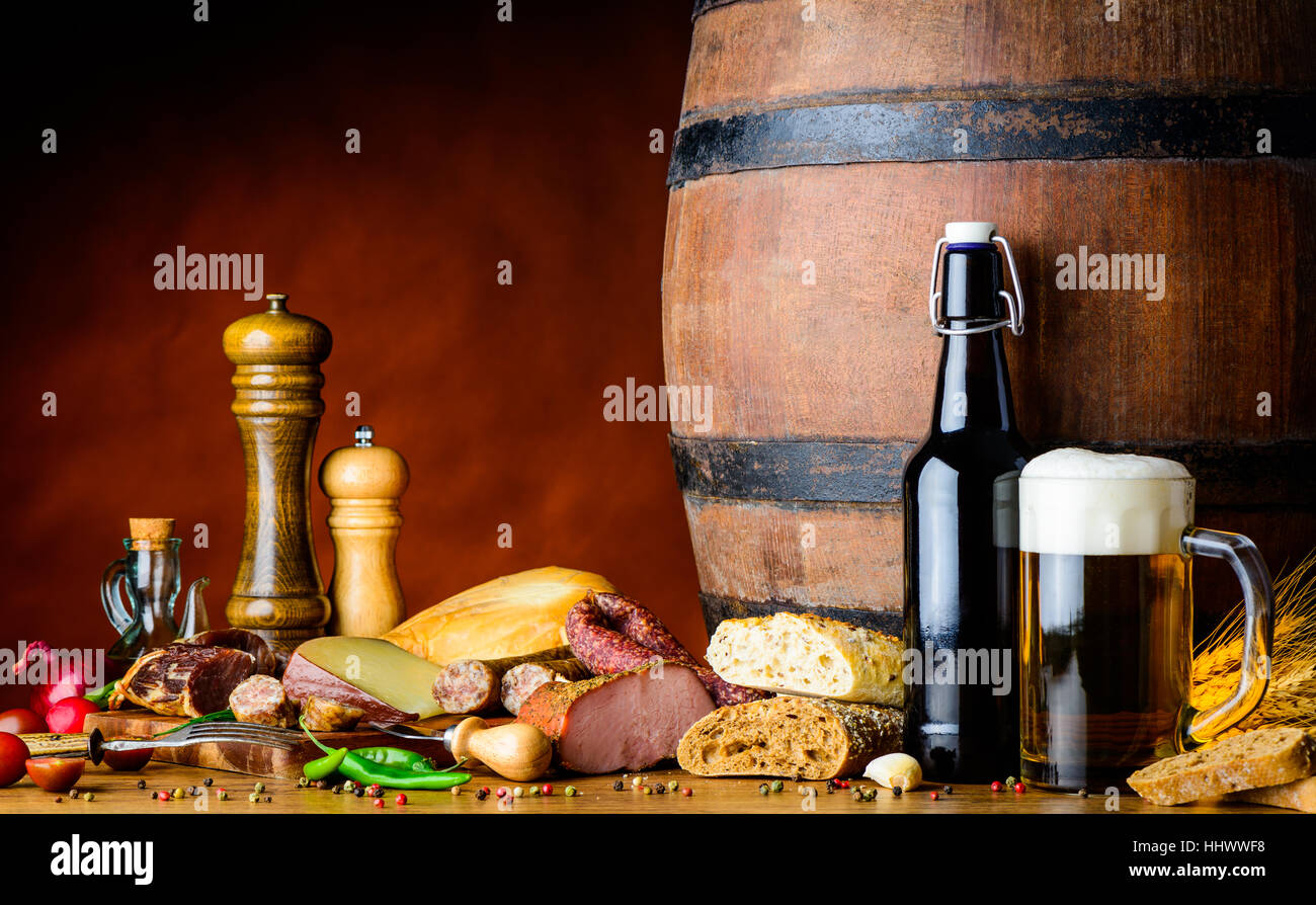 Food and Beer in a rustic cellar Stock Photo - Alamy