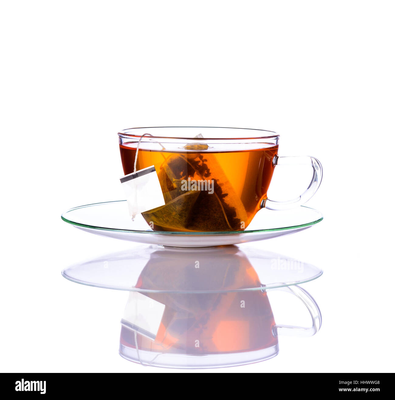 One glass Tea cup with tea-bag isolated on white background Stock Photo ...