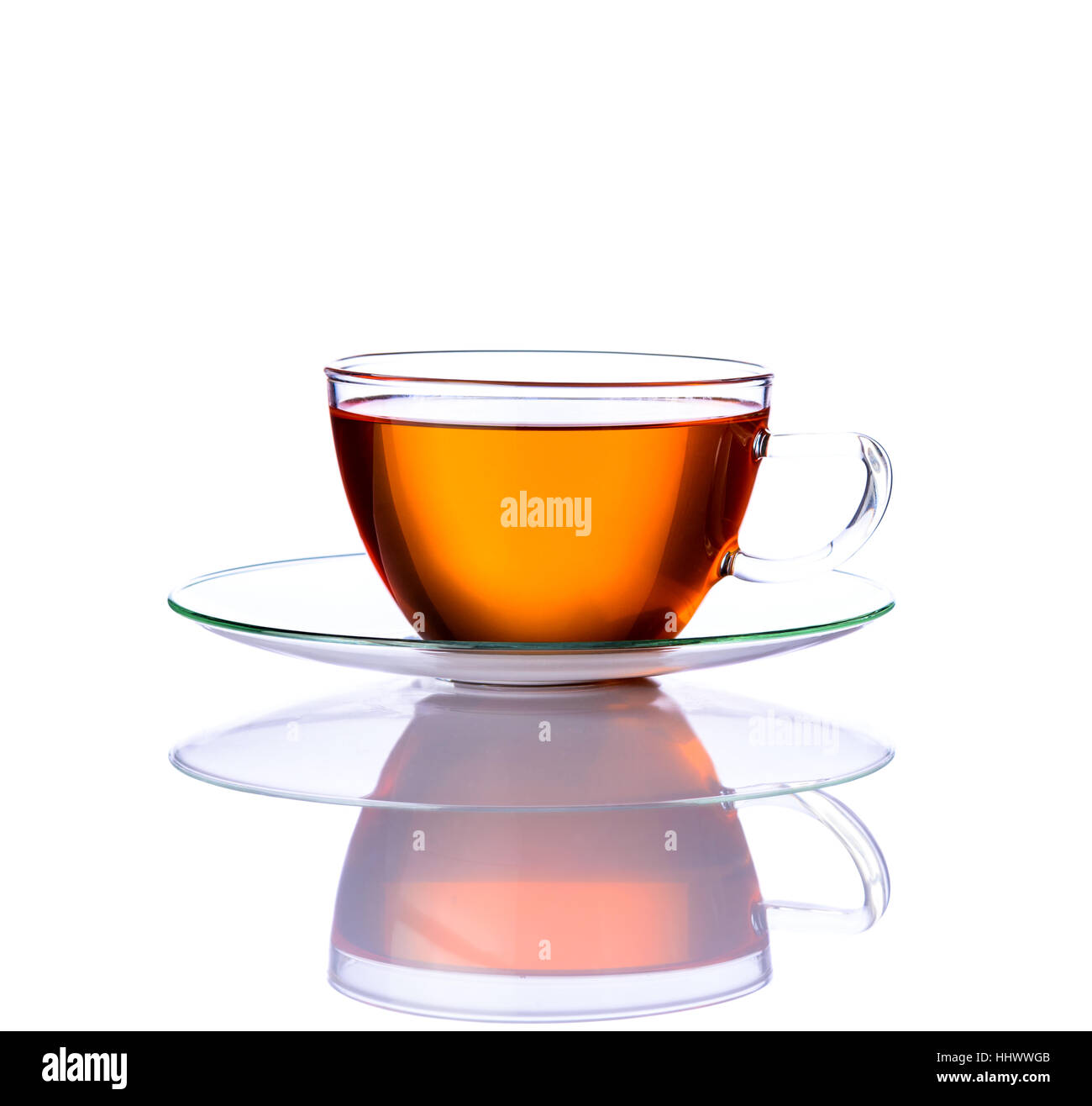 One Tea-Cup isolated on white background. Tea is in glass cup with ...