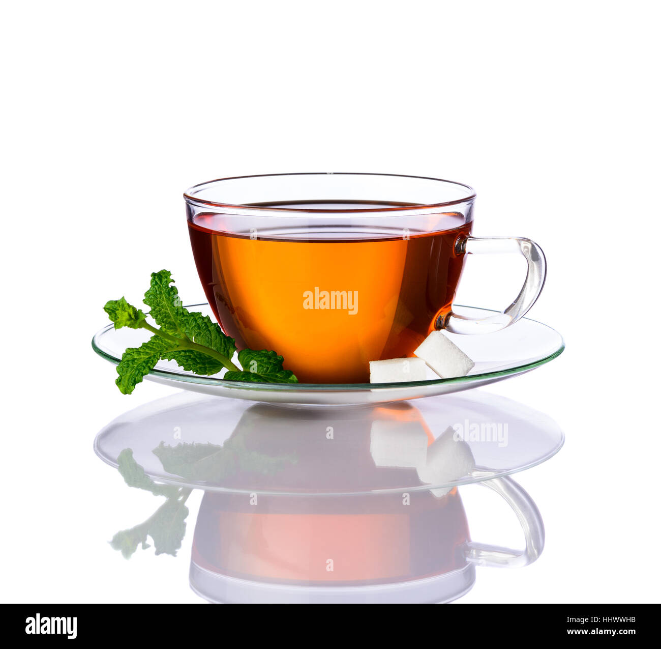 Cup of Mint tea isolated on white background and green leaves Stock ...