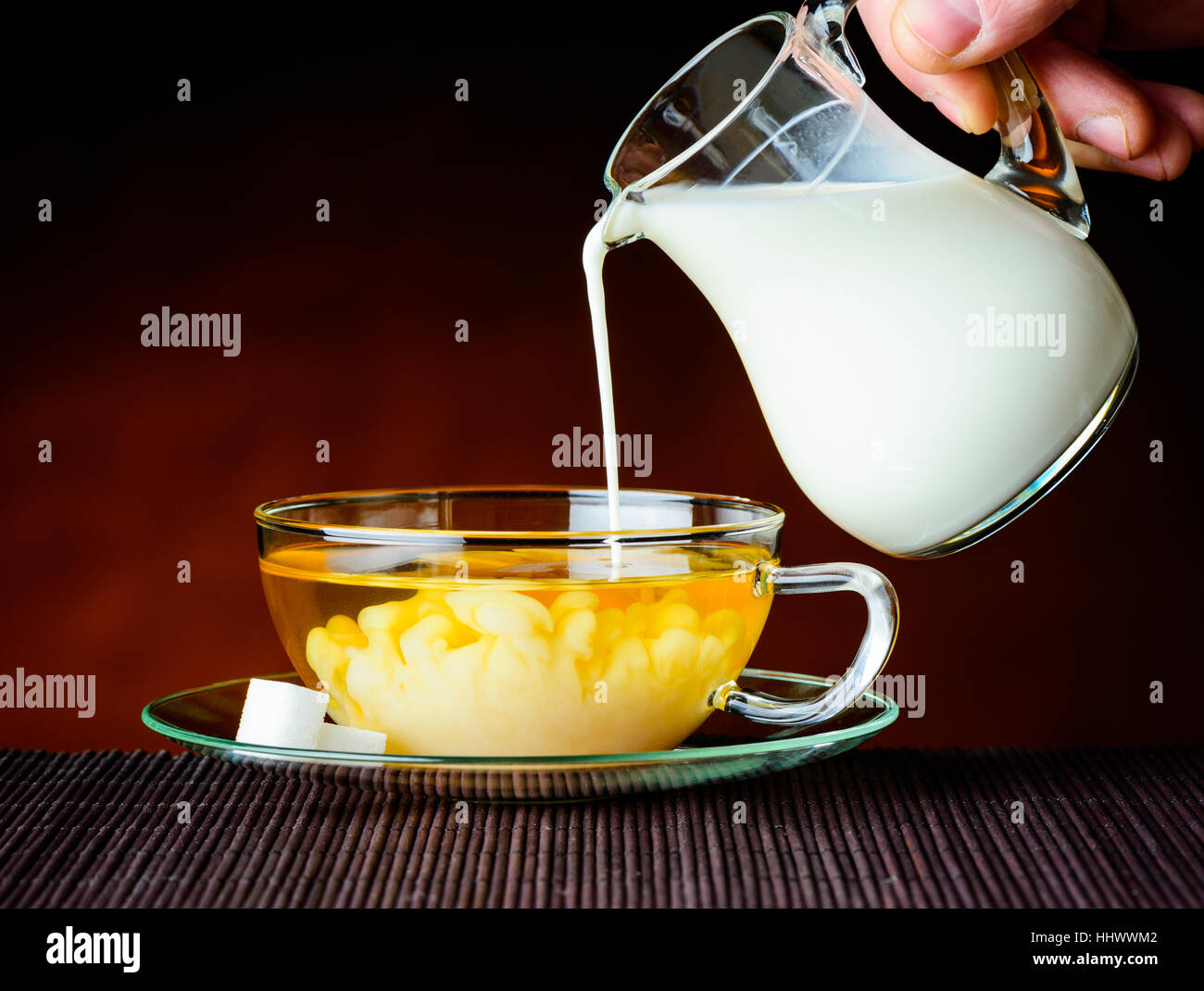 Milk mixing into tea hi-res stock photography and images - Alamy