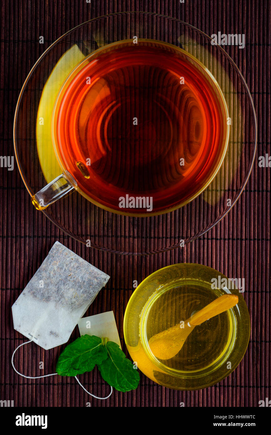 Top-down-view of Tea cup with honey sweetener and tea-bag Stock Photo ...
