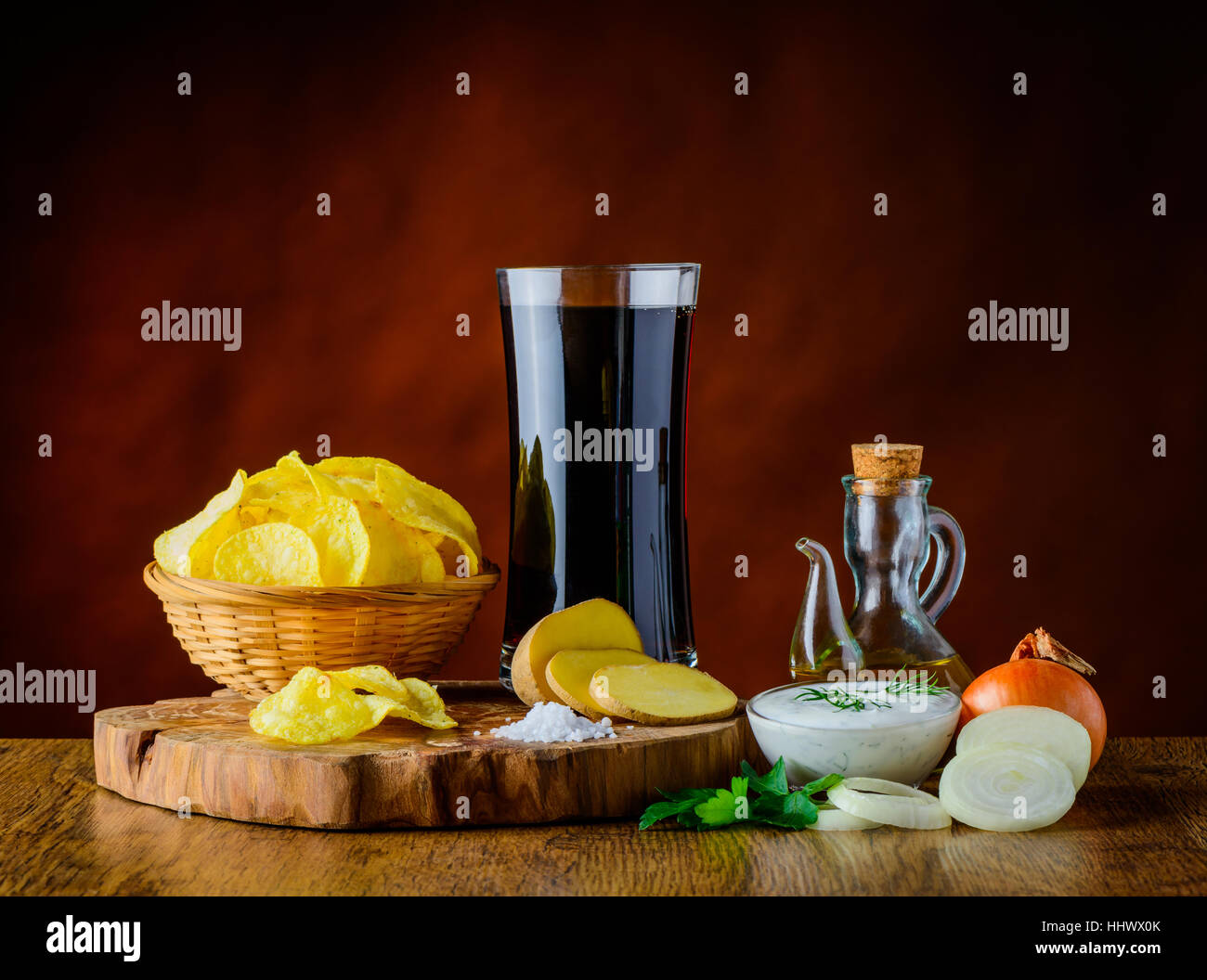 Still life of Potato-chips, cola and ingredients Stock Photo - Alamy