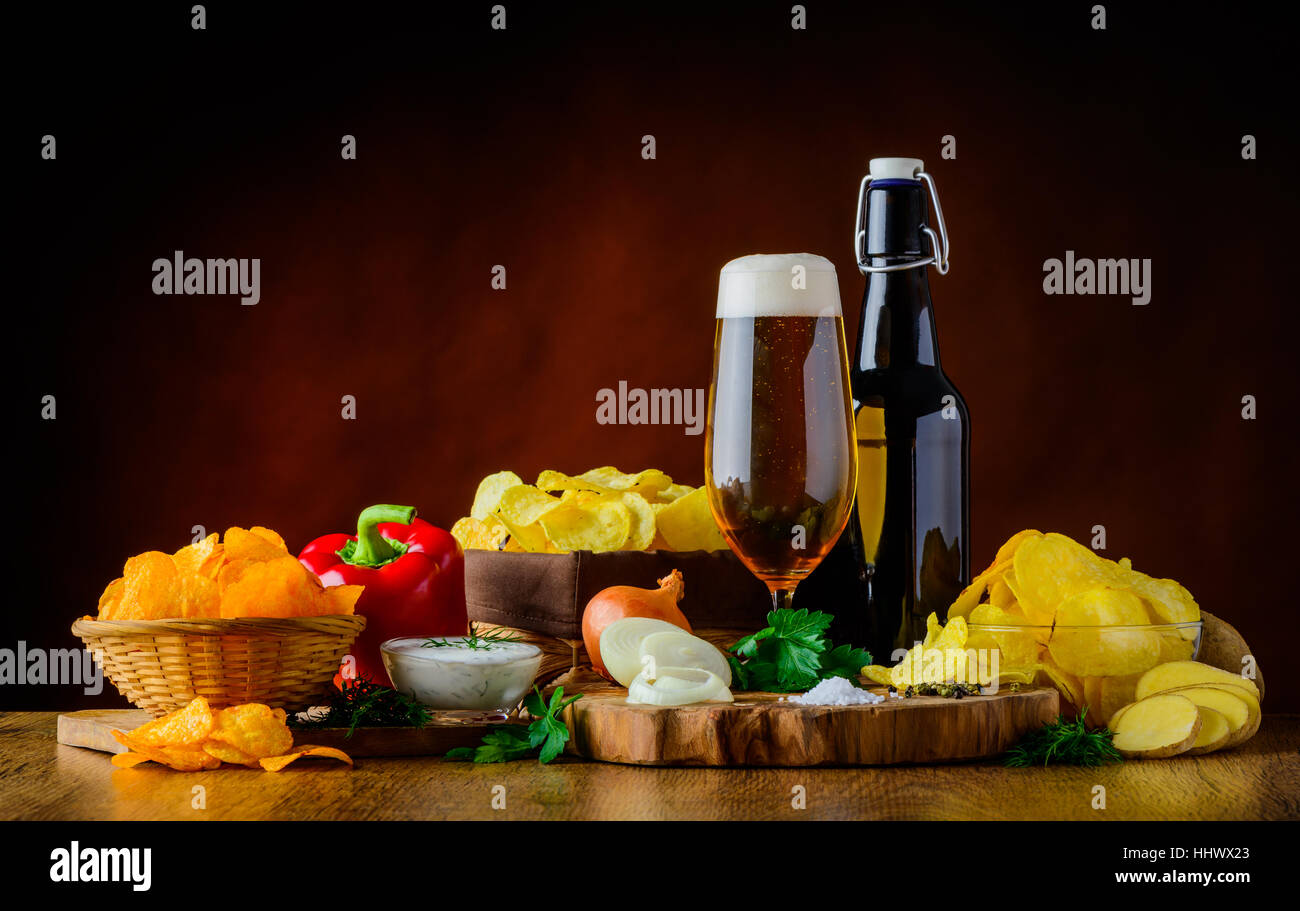 Potato-Chips ingredients with glass and bottle beer Stock Photo - Alamy
