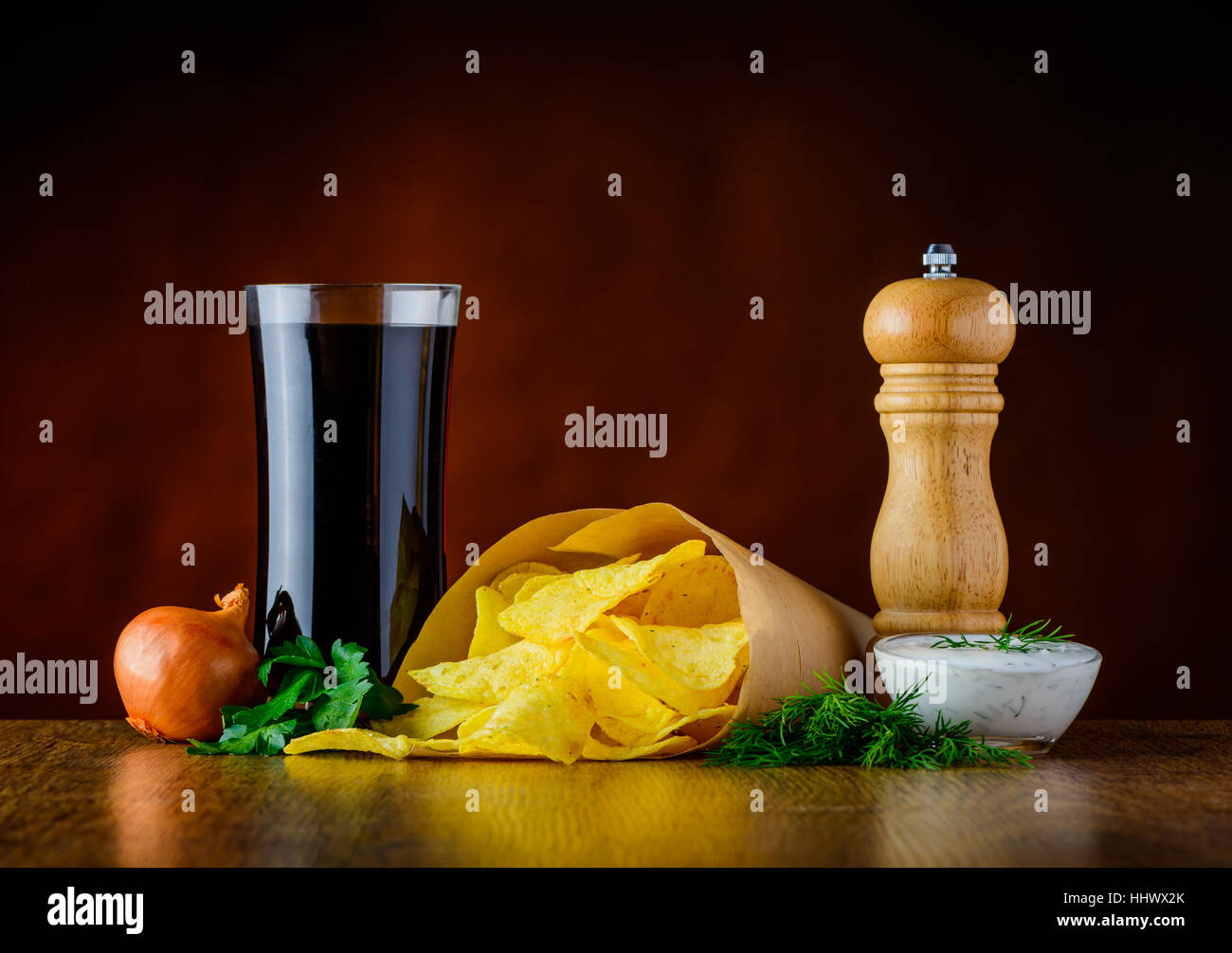 Glass of Cola with Potato-Chips and dip Stock Photo - Alamy
