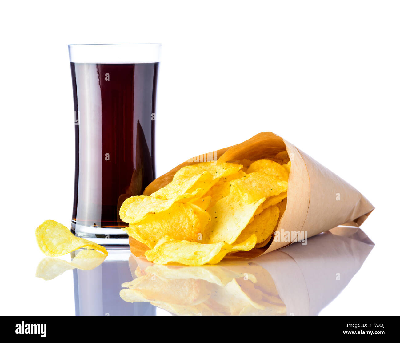 Paper bag of Potato chips and glass of cola isolated on white ...