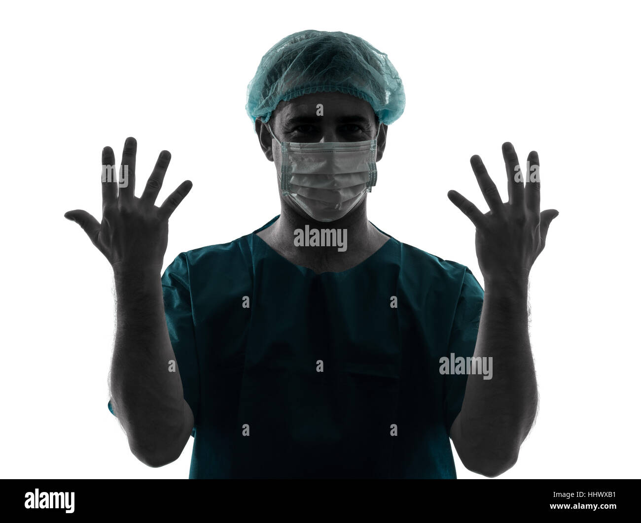 one caucasian doctor surgeon man showing hands portrait with face mask ...