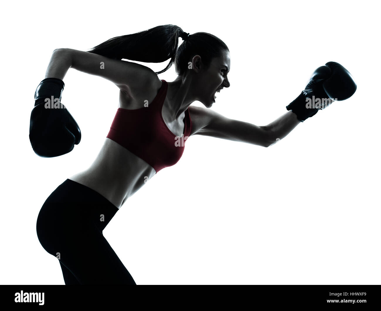 one caucasian woman boxing exercising in silhouette studio isolated on ...
