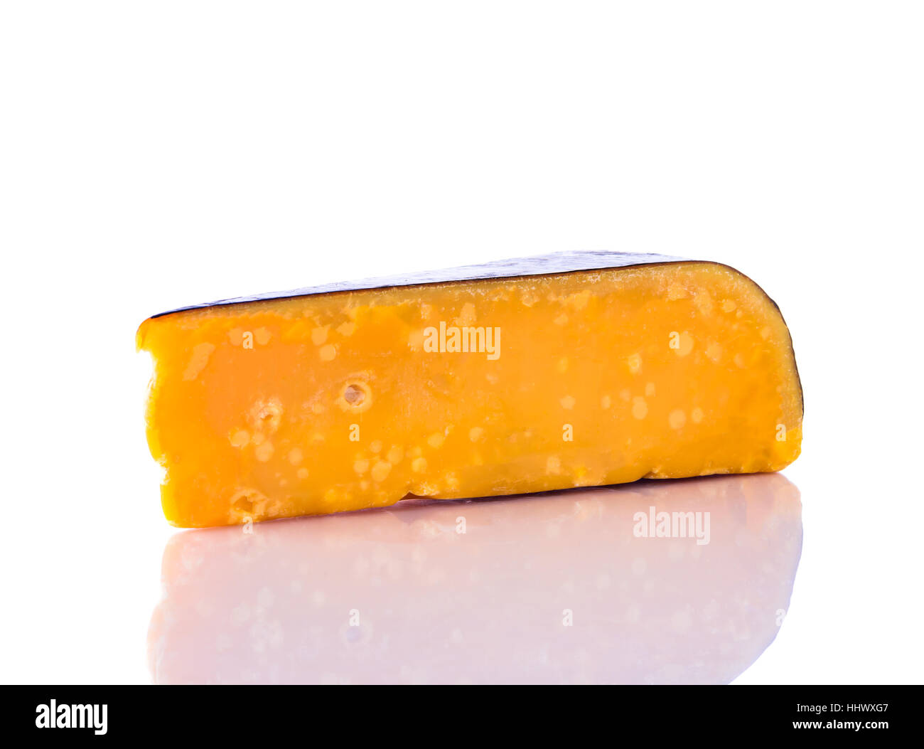 Yellow aged gouda cheese isolated on white background Stock Photo - Alamy