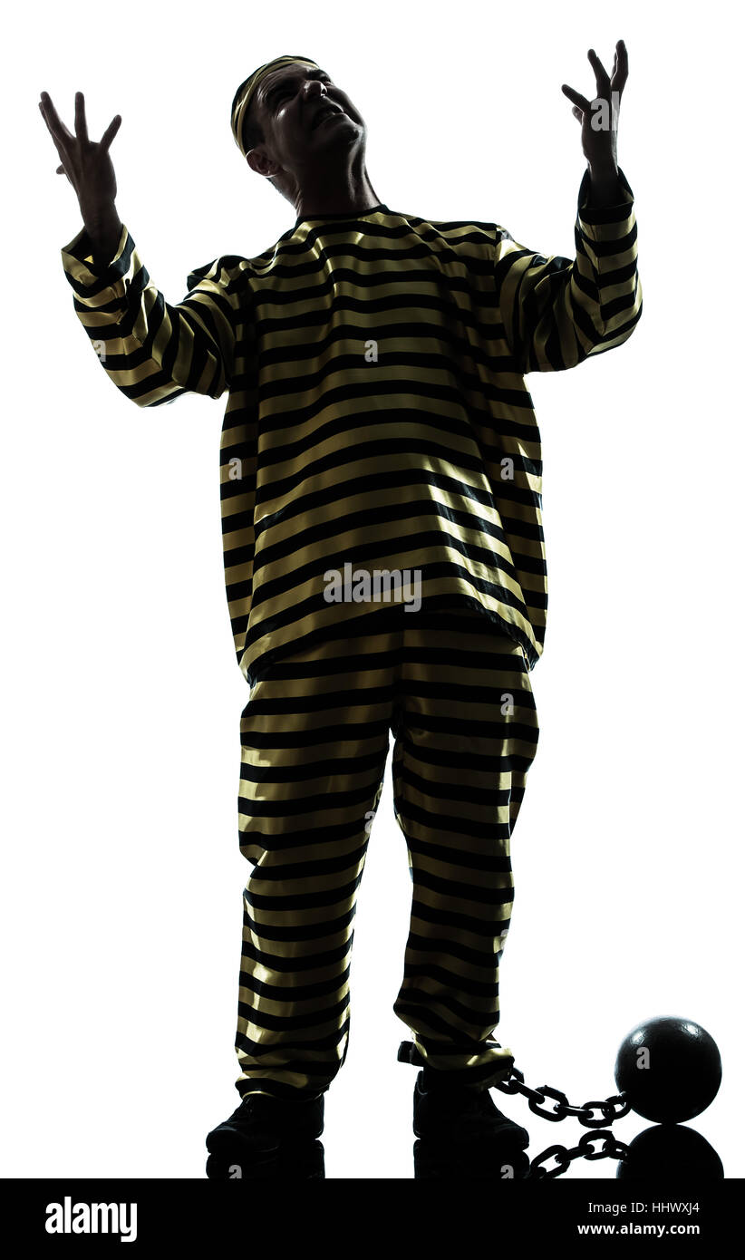 one caucasian man prisoner criminal with chain ball in studio isolated ...