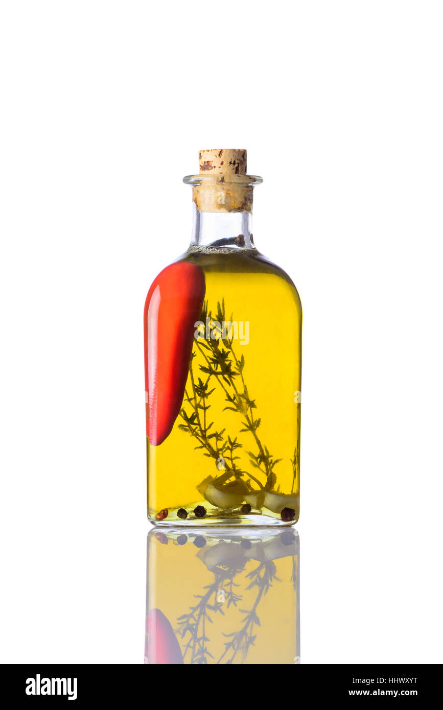 Bottle of Cooking Oil on White background with green thyme and red ...