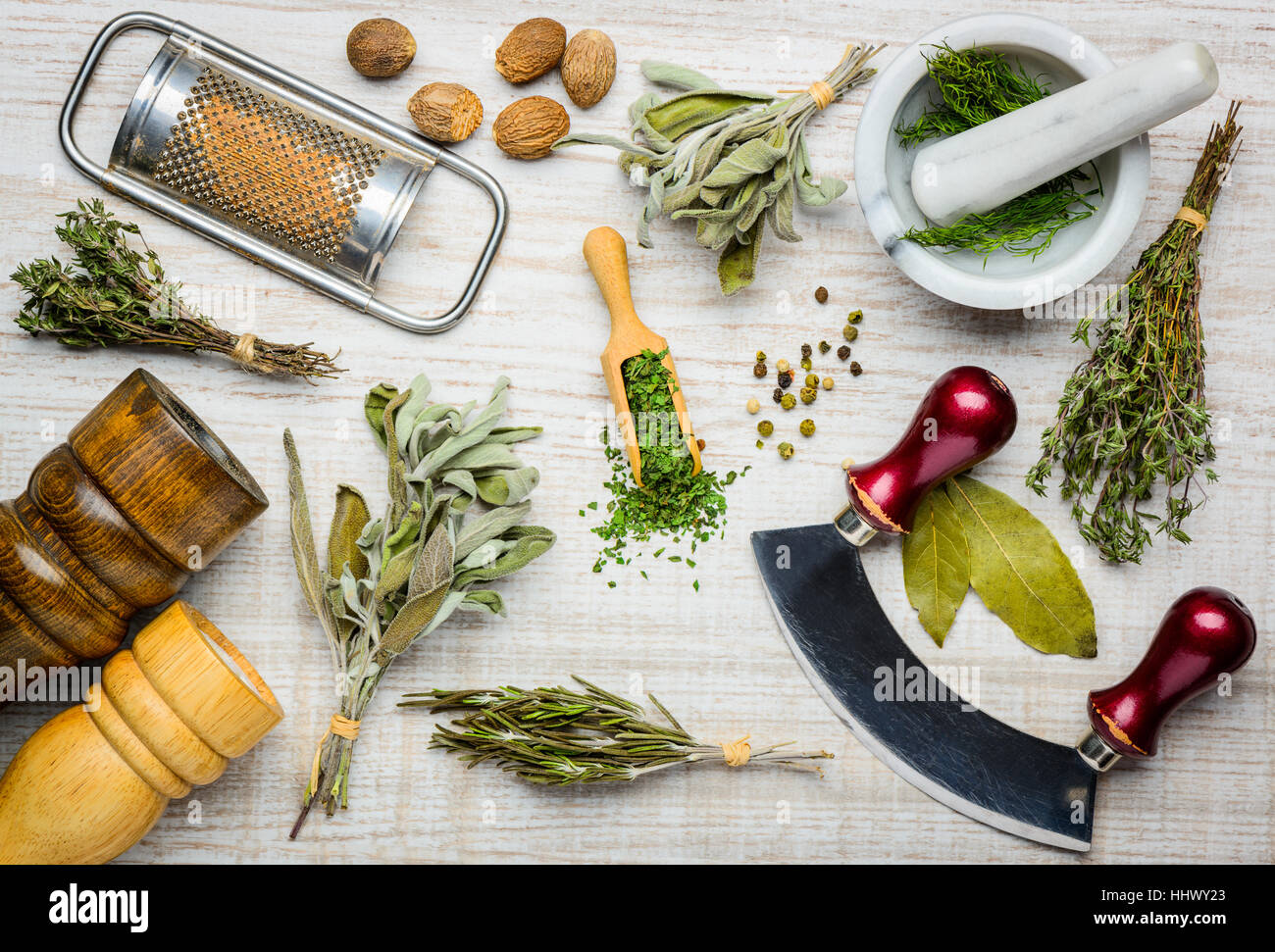 Cooking ingredients, herbs, spices and seasoning with kitchen utensils ...