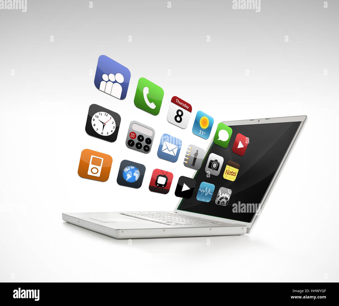 Laptop with application symbols coming from it on white background ...