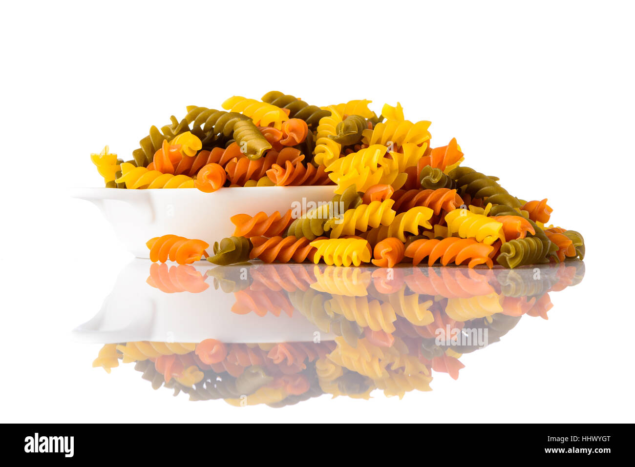 Green, red and yellow colored Fusilli Doppia Rigatura Pasta. Italian ...