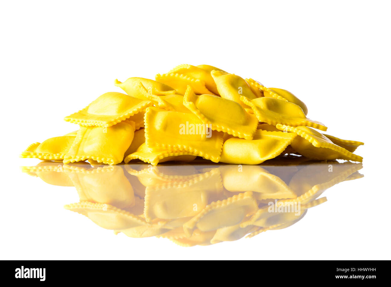 Italian cuisine food and Yellow Ravioli Pasta isolated on white ...