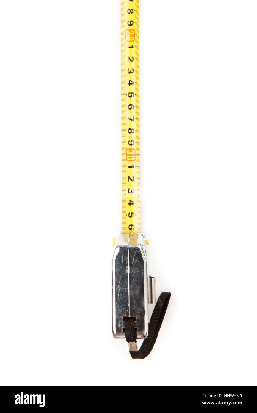 Self-retracting yellow measuring tape Stock Photo - Alamy