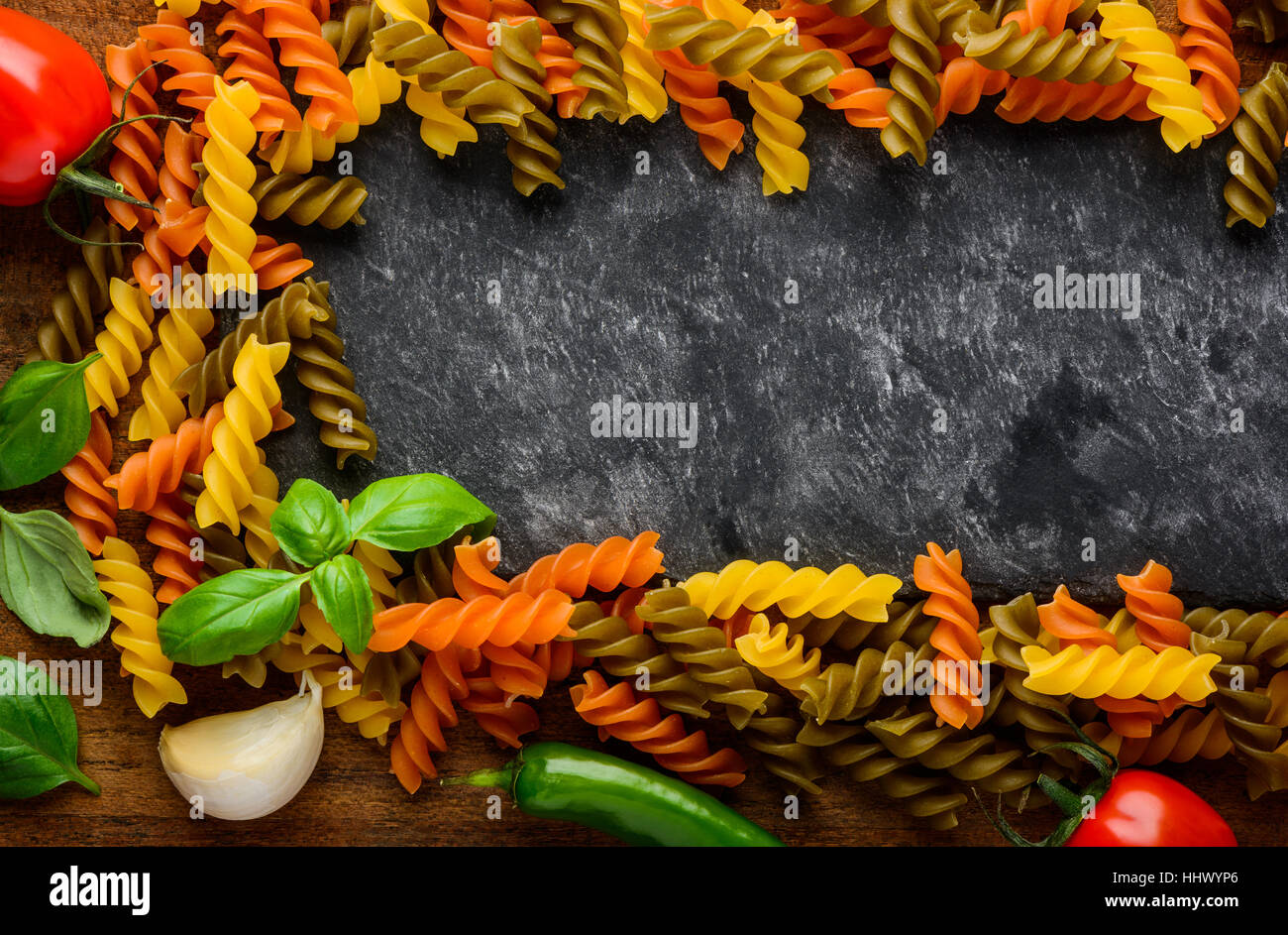 Colored Fusilli Doppia Rigatura and copy space frame. Italian food ...