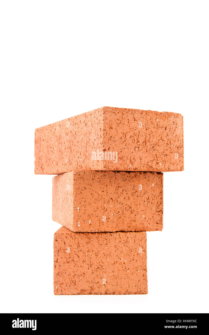 Stack of three clay bricks against white background Stock Photo - Alamy
