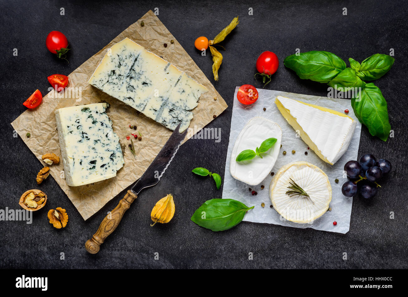 Two Different types of cheese, Blue Mold Gorgonzola cheese and Brie ...