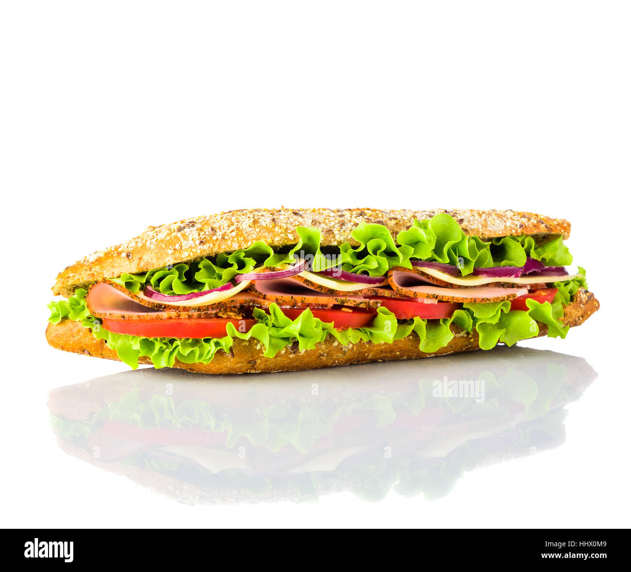 long Sandwich with Vegetables, meat and cheese isolated on white ...