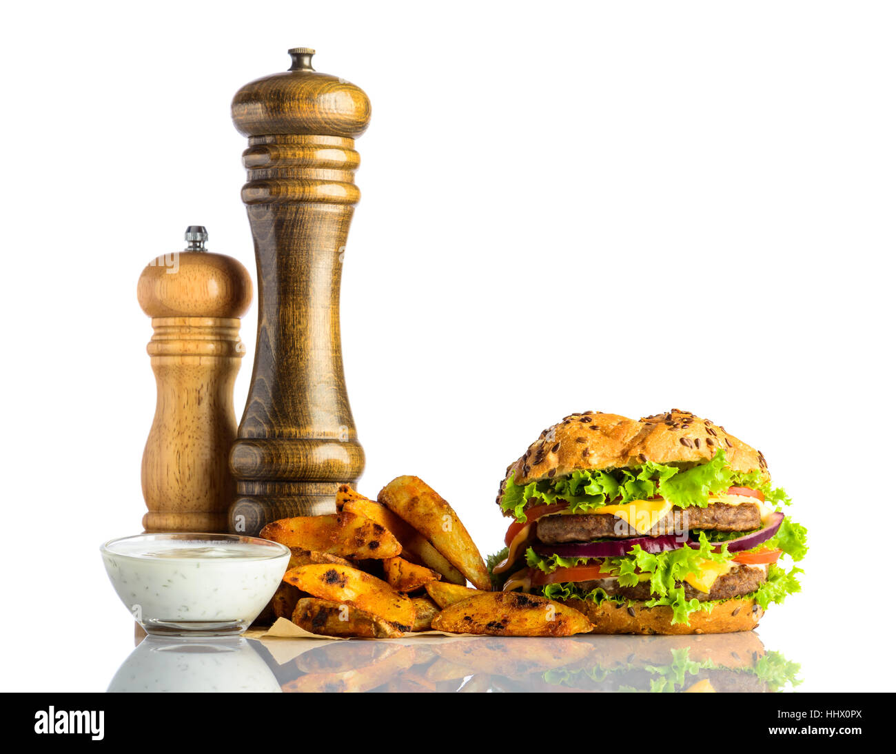 Fast Food Burger Sandwich with Fried Potatoes and white dipping souce ...