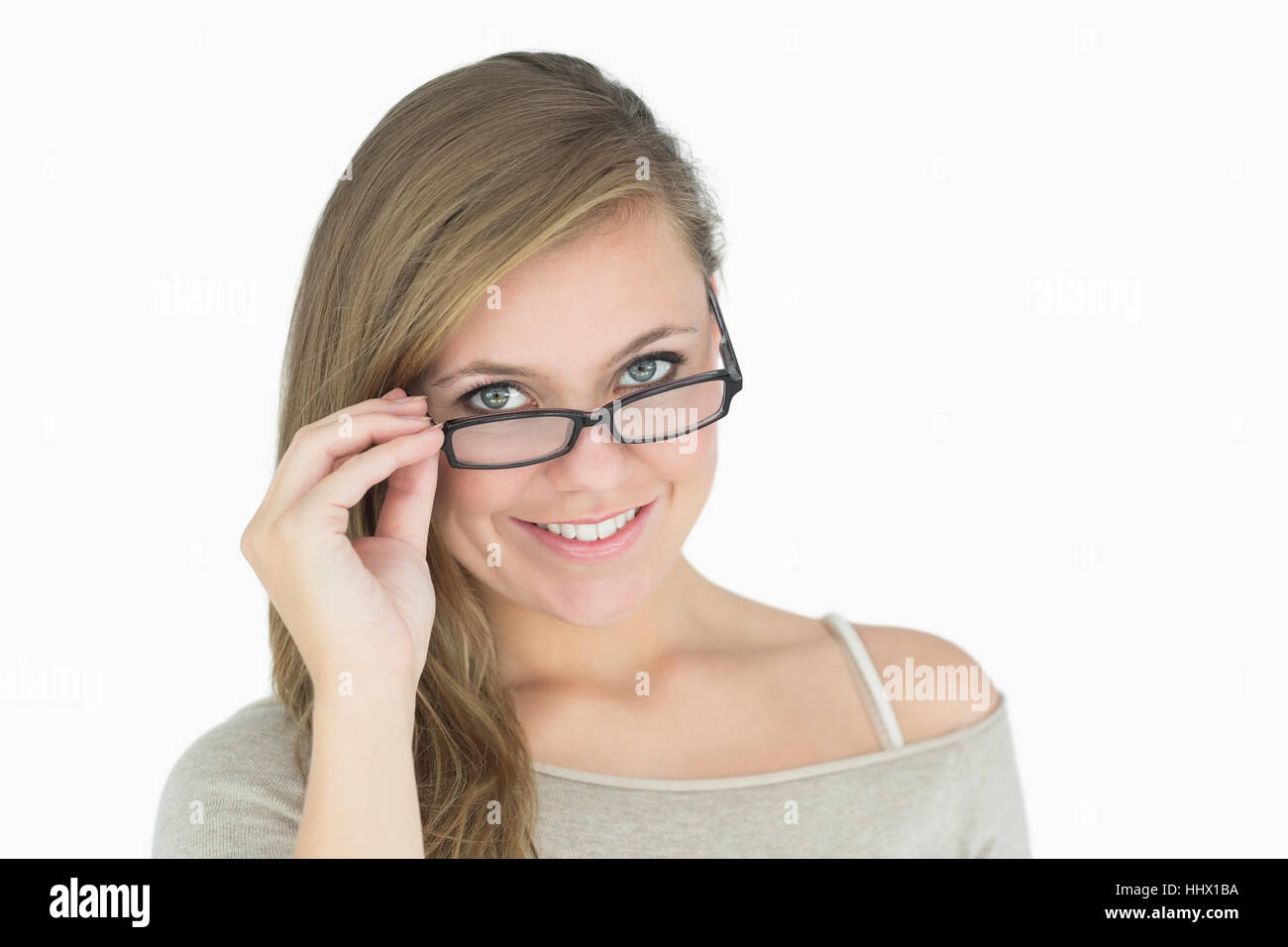 Beautiful woman tilting down glasses hi-res stock photography and ...