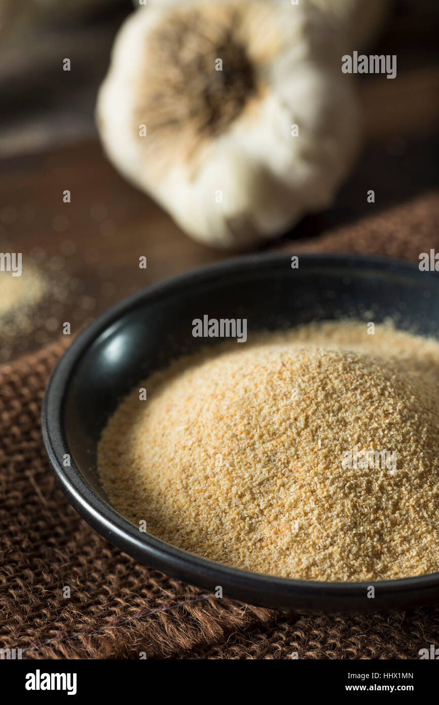Dry Organic Ground Garlic Spice in a Bowl Stock Photo - Alamy