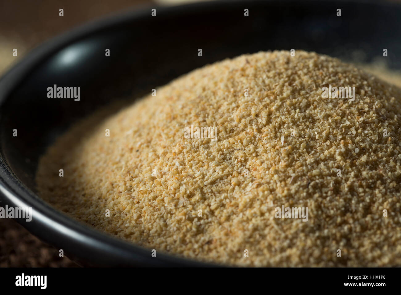 Dry Organic Ground Garlic Spice in a Bowl Stock Photo - Alamy
