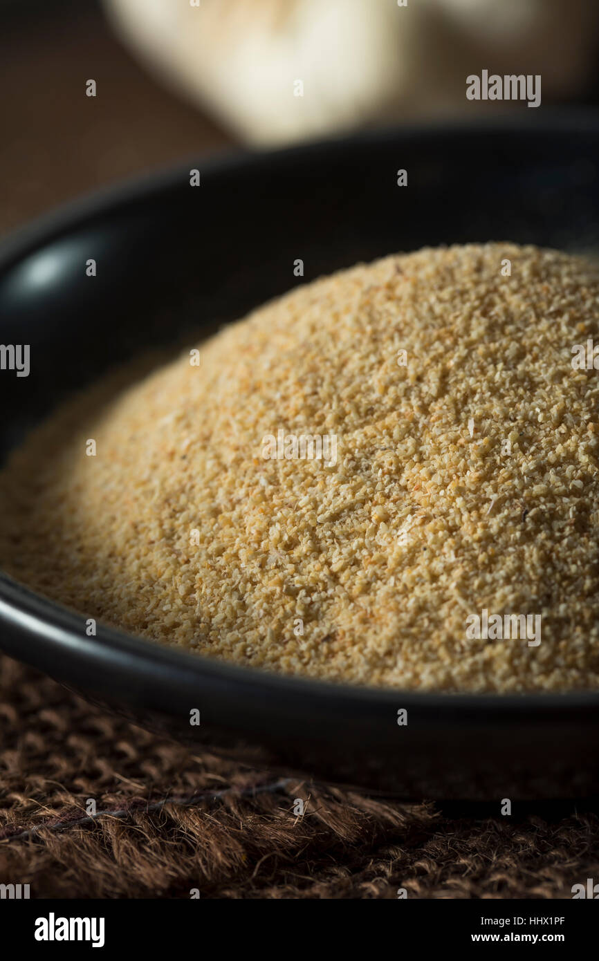 Dry Organic Ground Garlic Spice in a Bowl Stock Photo - Alamy
