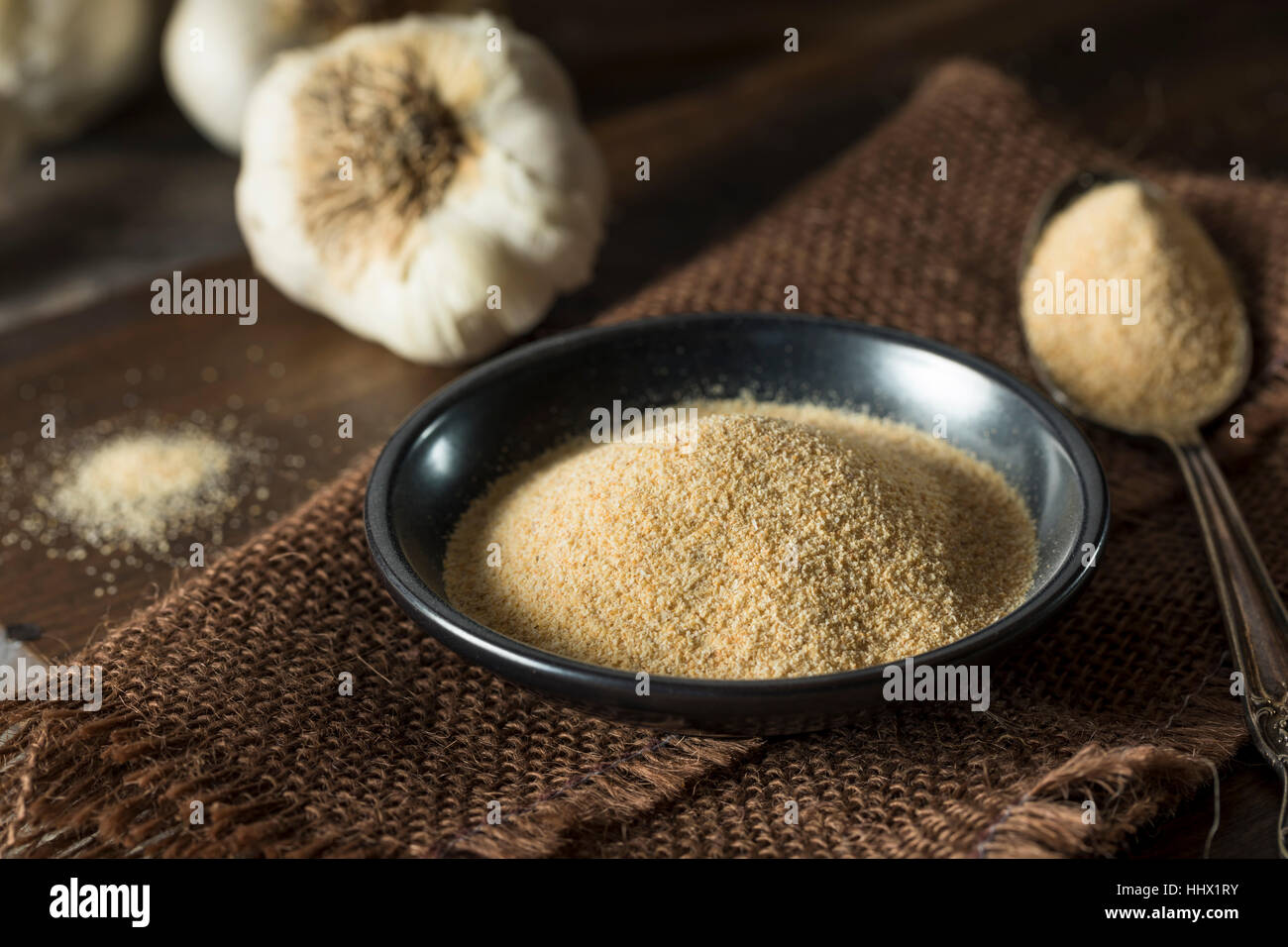 Dry Organic Ground Garlic Spice in a Bowl Stock Photo - Alamy