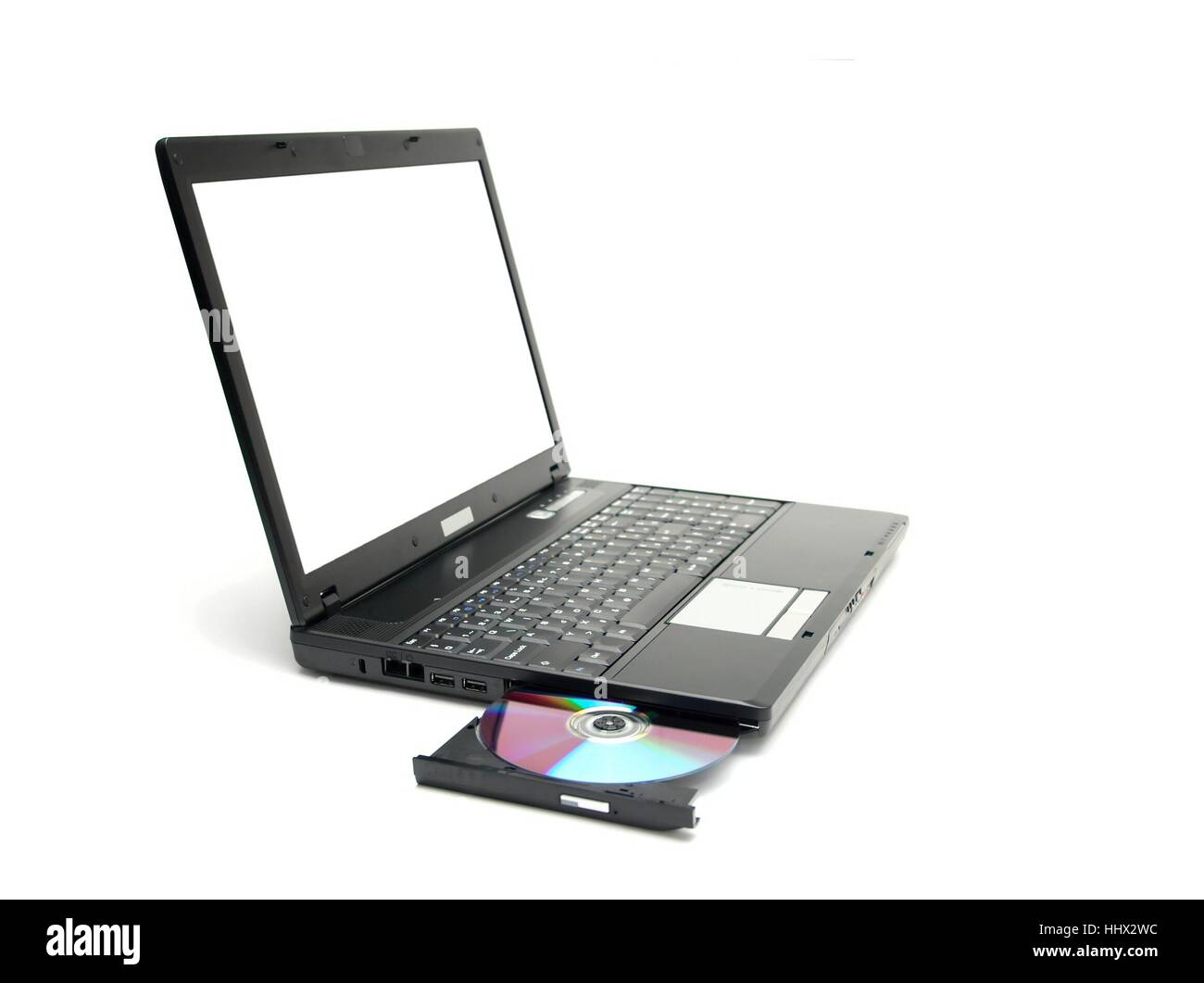 Laptop on white background with open CD tray Stock Photo - Alamy