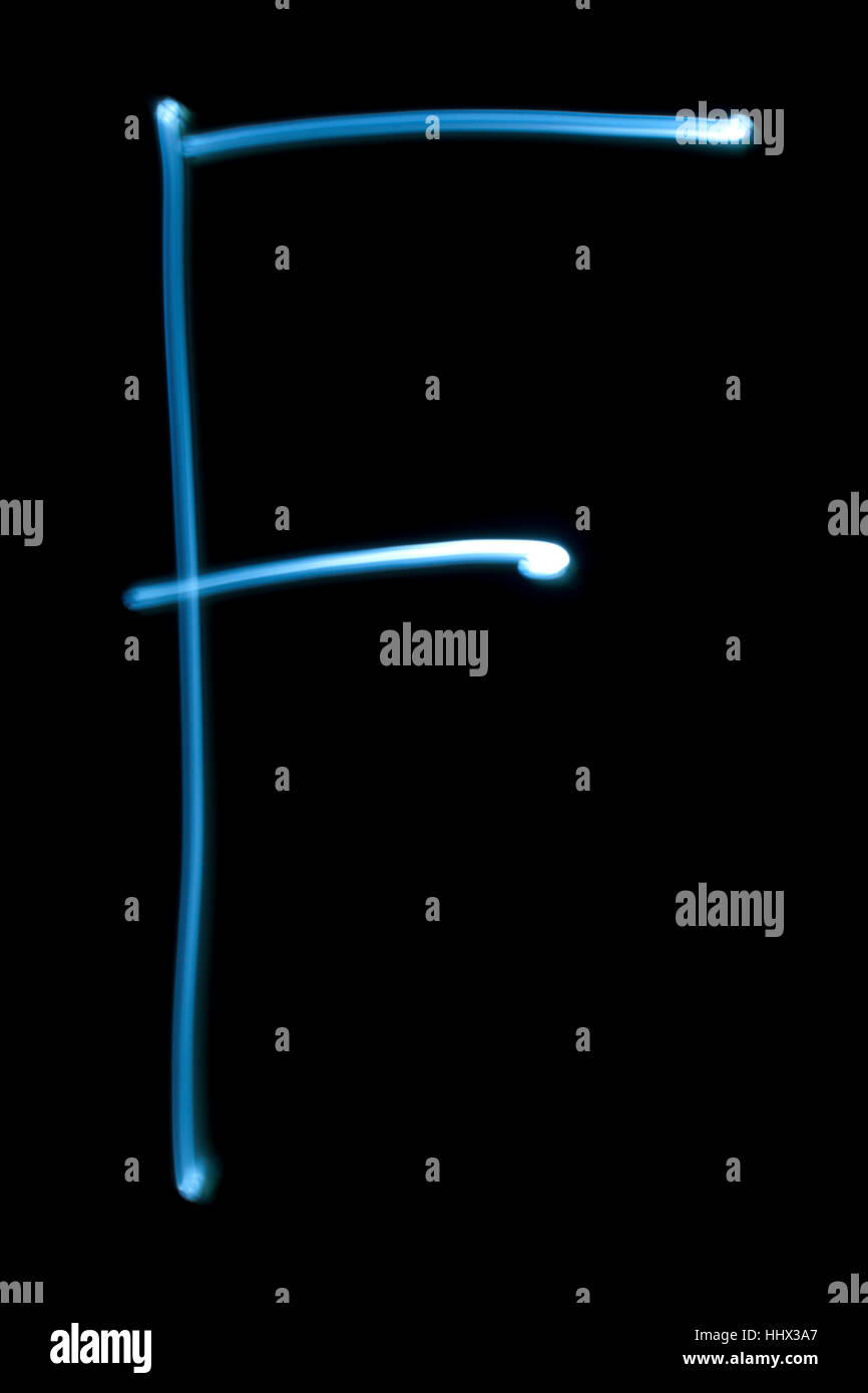 The letter F from natural neon light Stock Photo - Alamy