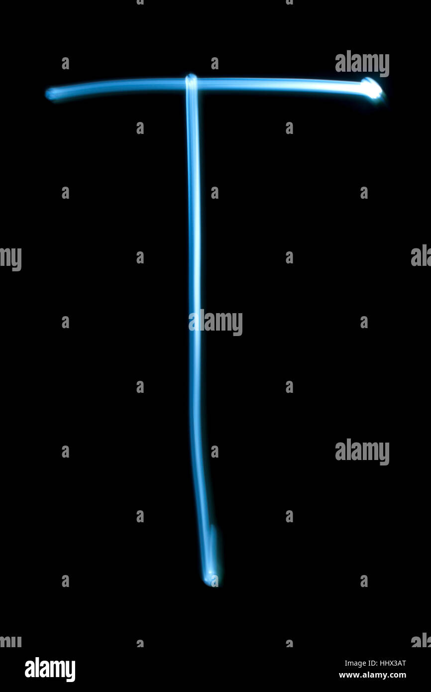 The letter T from natural neon light Stock Photo - Alamy