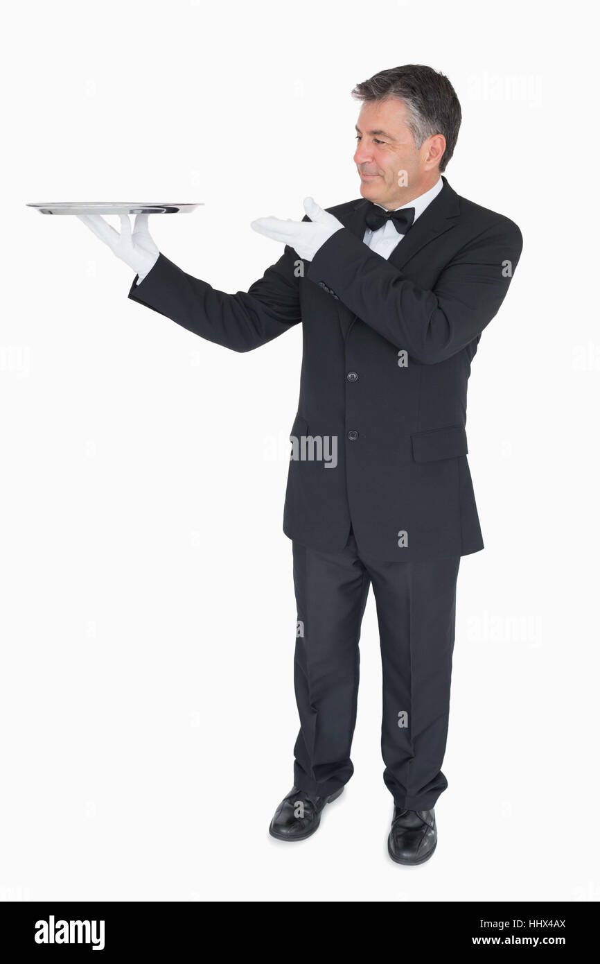 Waiter presenting on tray hi-res stock photography and images - Alamy