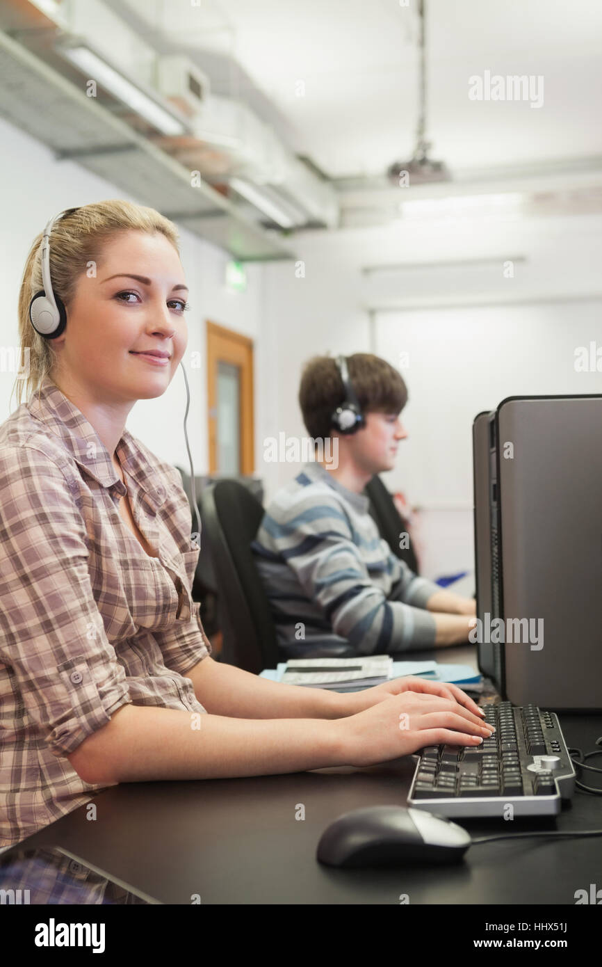 Woman working in computer class in college Stock Photo - Alamy