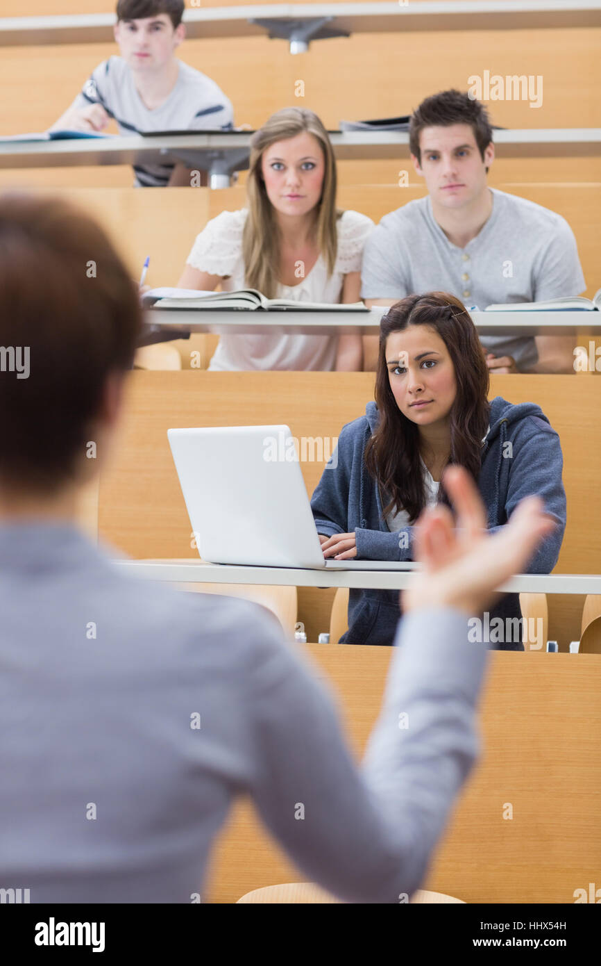 Lecturer holding textbook hi-res stock photography and images - Alamy